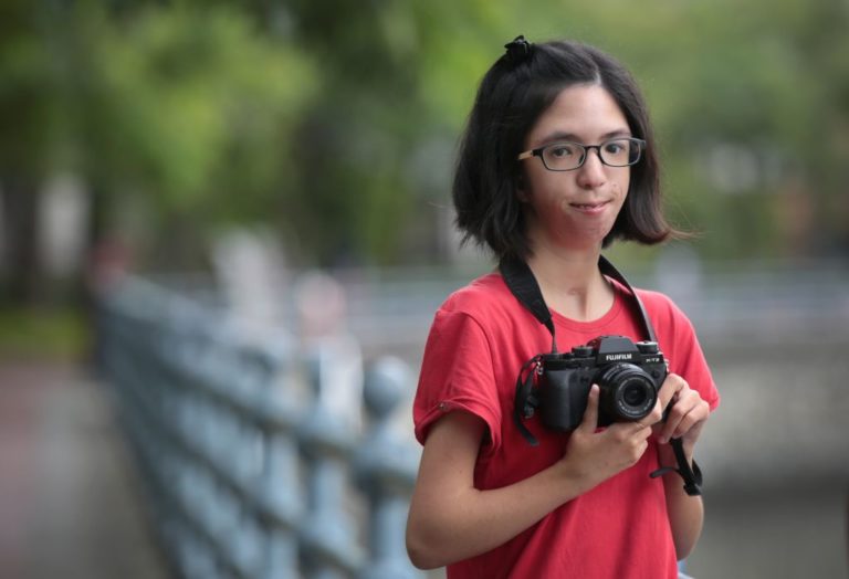 Living with grace through the lens of photographer born with disability ...